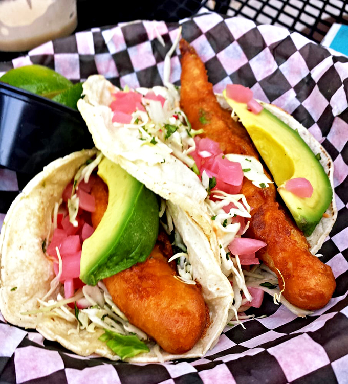 Fish tacos that make you question why you'd ever eat anything else. That perfect harmony of crispy, creamy, and fresh that makes taste buds do a happy dance.