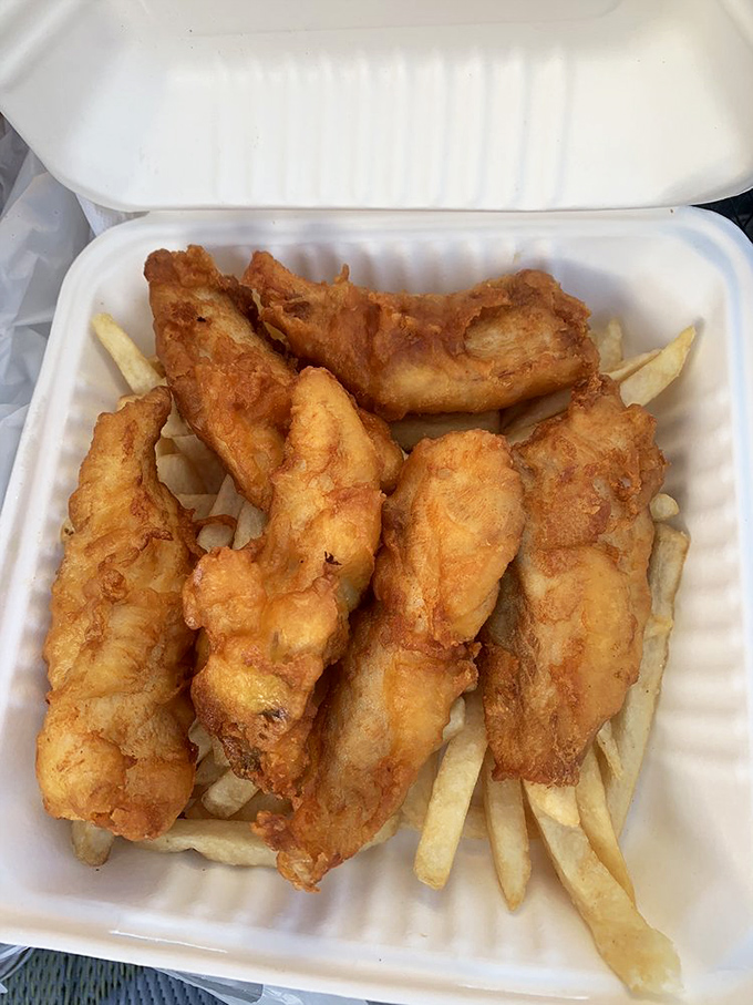 Fish and chips that would make a British pub jealous. Golden-battered fish with a crunch you can practically hear through the photo.