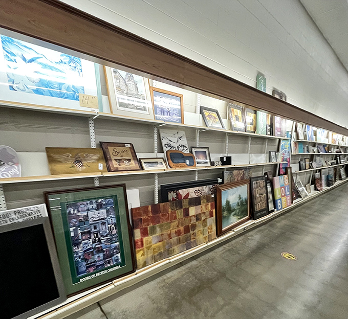 The art wall offers everything from hotel room abstracts to lovingly framed family photos. Someone's former wall decor becomes your conversation starter.