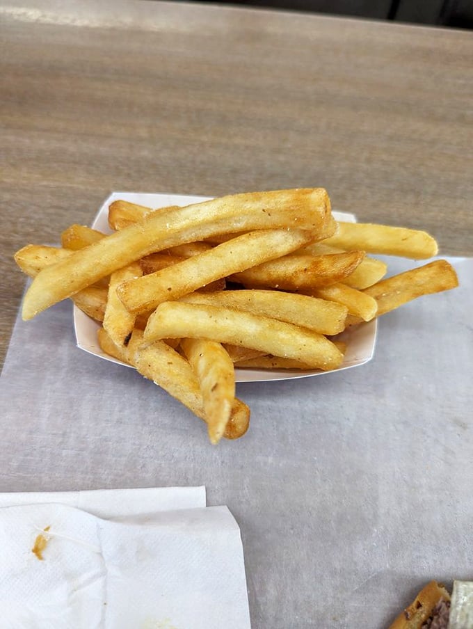 Golden fries that prove sometimes the most perfect things come without fancy seasoning or pretense.