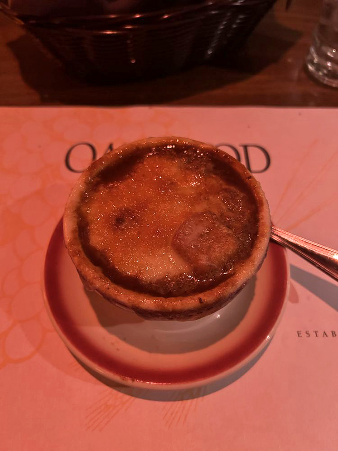 French onion soup that's achieved the impossible trifecta: gooey cheese stretch, rich broth depth, and a crust that deserves its own standing ovation.