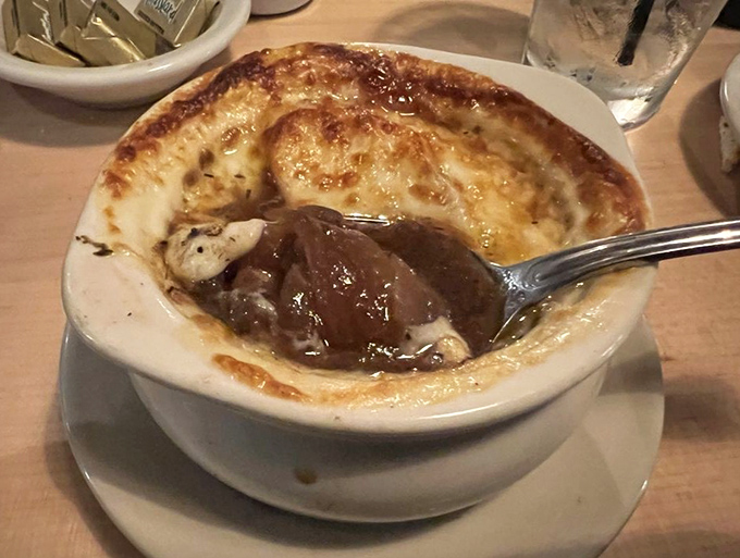 French onion soup that's worth the cheese pull struggle. The battle between your spoon and that glorious melted gruy&egrave;re is one you'll happily fight.