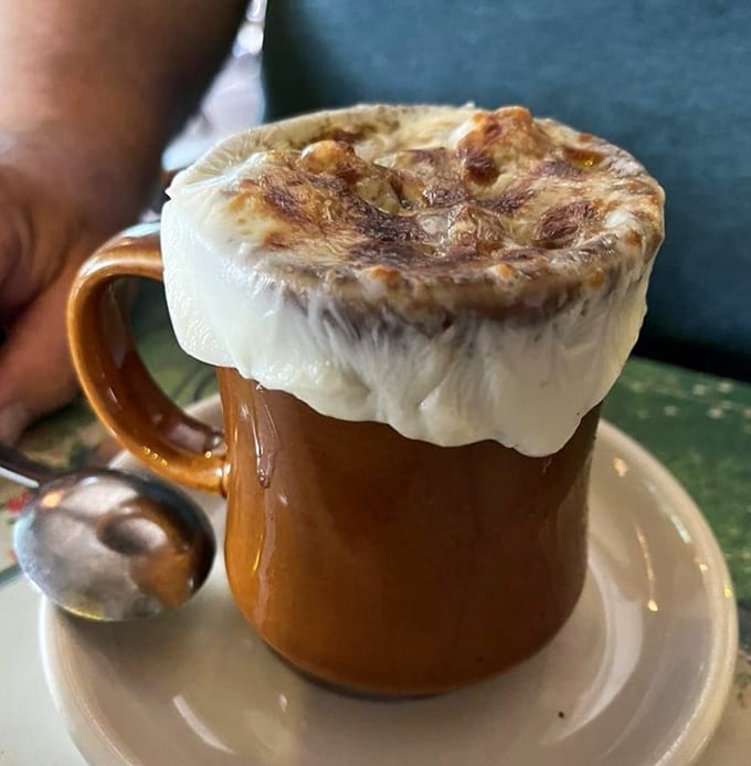 This isn't just French onion soup&mdash;it's a cheese-crowned masterpiece that requires a commitment. The relationship starts with a spoon and ends with stretchy, glorious strings.