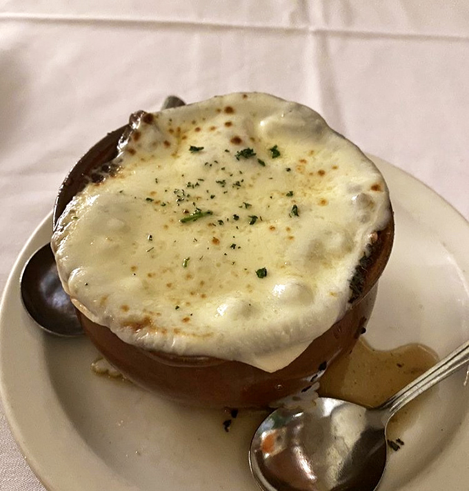 French onion soup that could make a Parisian weep with joy. That cheese pull would break Instagram if social media existed when this recipe was perfected.