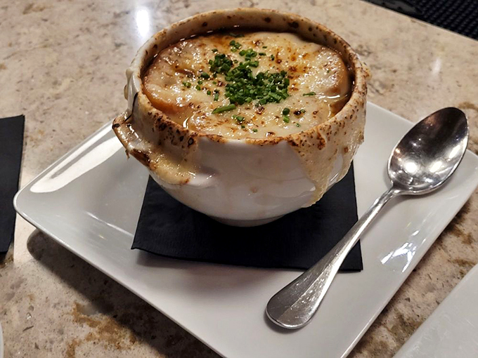 French onion soup that doesn't just warm your body&mdash;it hugs your soul. That bronzed cheese cap is practically begging for a dramatic spoon-crack moment.