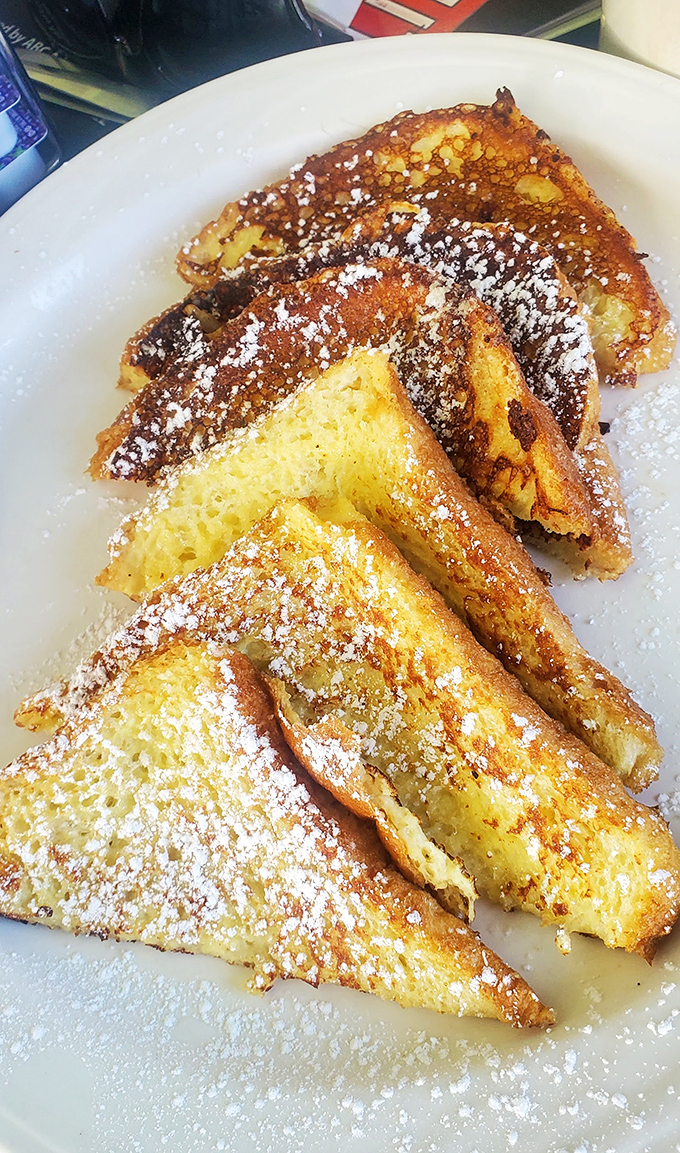 French toast that makes you question why you ever bothered with cereal&mdash;golden, custardy, and dusted with powdered sugar like fresh Pennsylvania snow.