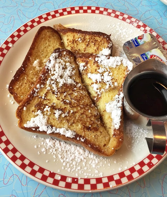 French toast dusted with powdered sugar like a light Missouri snowfall &ndash; simple, beautiful, and utterly irresistible.