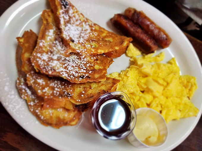 French toast that makes you question every other French toast you've ever eaten. The powdered sugar isn't decoration&mdash;it's necessary balance.