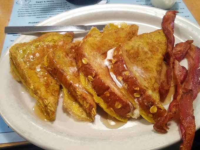 French toast that's crossed the line from breakfast to dessert, with a maple syrup waterfall that would make Niagara Falls jealous.