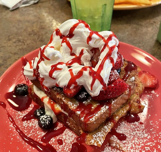 French toast that puts ordinary breakfast to shame. With berries, whipped cream, and that strawberry drizzle&mdash;it's morning decadence at its finest.