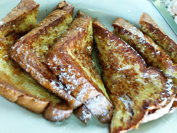 French toast so golden and perfect, it makes the Mona Lisa look like amateur hour.