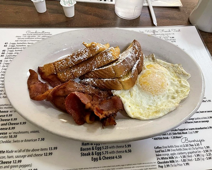 French toast that's actually been introduced to France, crispy bacon with just the right chew, and an egg sunny enough to brighten even Cleveland's cloudiest day.