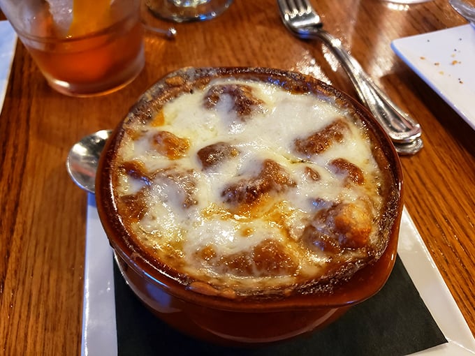 Behold the star attraction: prime rib so perfectly pink it should have its own Instagram account, accompanied by a baked potato worthy of co-star status.
