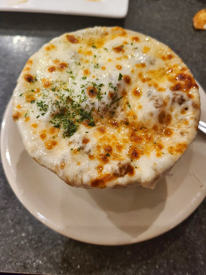 French onion soup that's achieved the perfect cheese-to-broth ratio&mdash;a bubbling masterpiece that's worth the inevitable chin dribble and temporary loss of dignity.