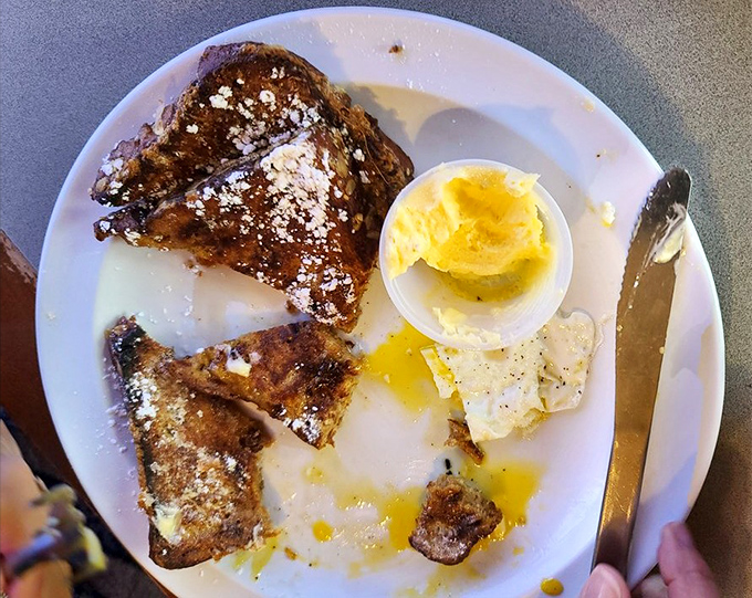 French toast that could make a Parisian weep &ndash; golden, crispy, and begging for that pat of butter.