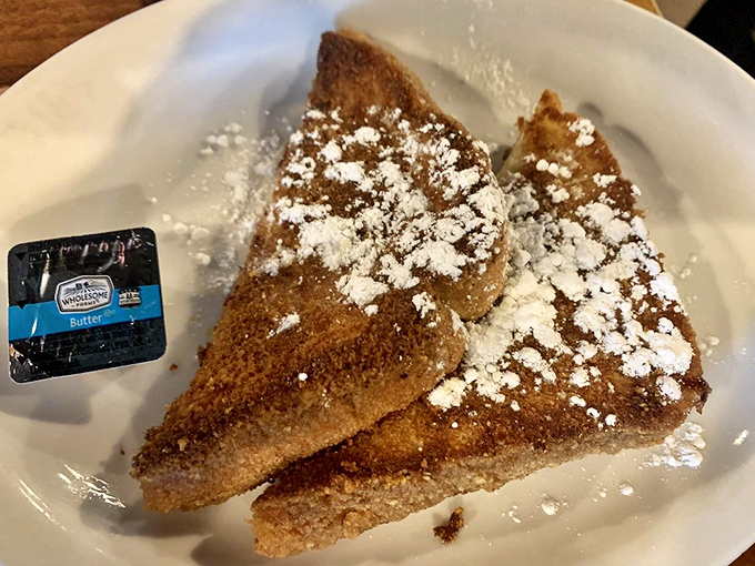 French toast that doesn't need a fancy pedigree to impress&mdash;just the perfect balance of crispy exterior, custardy interior, and a snowfall of powdered sugar.