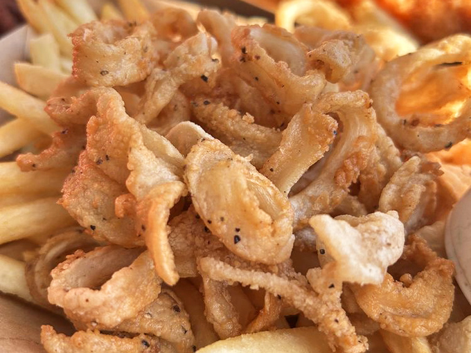 These fried calamari strips aren't rubbery hockey pucks &ndash; they're tender little treasures of the sea with a perfect crispy coating.