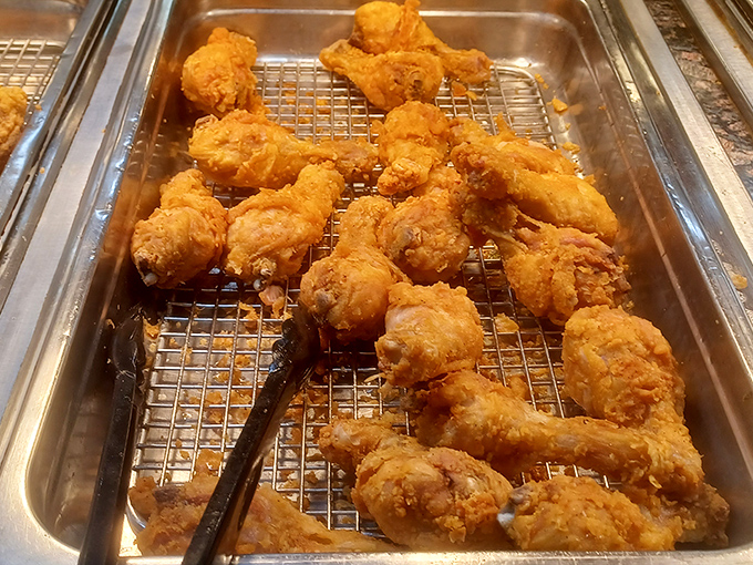 These golden-battered beauties aren't just fried chicken—they're edible time machines to Sunday dinners at grandma's house, minus the cheek-pinching.