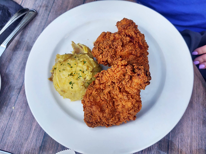 Southern fried chicken that's audibly crunchy on the outside, cloud-soft inside, and paired with mashed potatoes that clearly never met a box.
