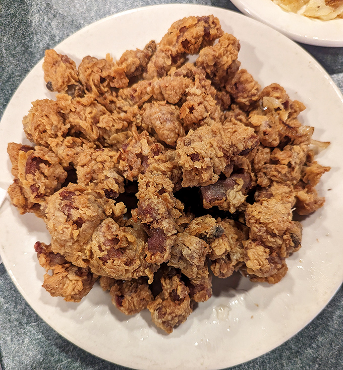 These aren't your average chicken livers&mdash;they're little nuggets of culinary courage, crispy outside and creamy within, waiting to convert the skeptical one bite at a time.