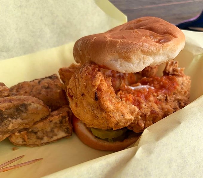 The chicken sandwich that launched a thousand road trips, nestled in its humble bun like royalty in disguise.