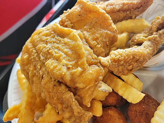 Golden-fried perfection that would make your grandmother both jealous and proud. This isn't just fried fish—it's Southern poetry on a plate.