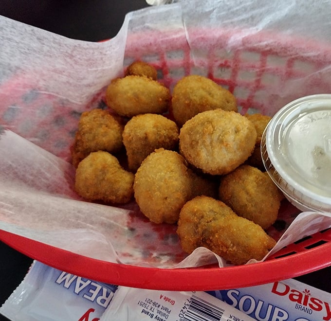 Golden-fried mushroom perfection that would make even vegetable skeptics reconsider their life choices. These crispy orbs of joy demand a dunk in ranch.