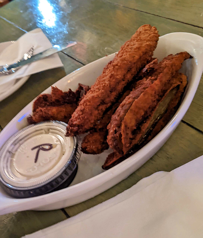 Fried pickles: The perfect marriage of tangy and crunchy that somehow makes both beer and conversation taste better.