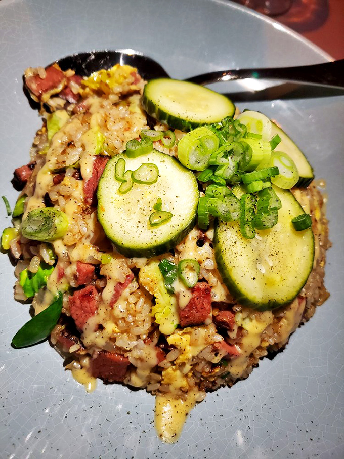 This colorful rice dish topped with fresh zucchini and scallions proves vegetables can party just as hard as proteins.