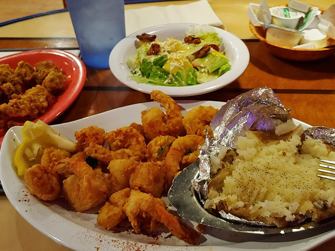 Golden-fried shrimp that crunch like your favorite childhood memories, served with a baked potato that's practically begging to be devoured.