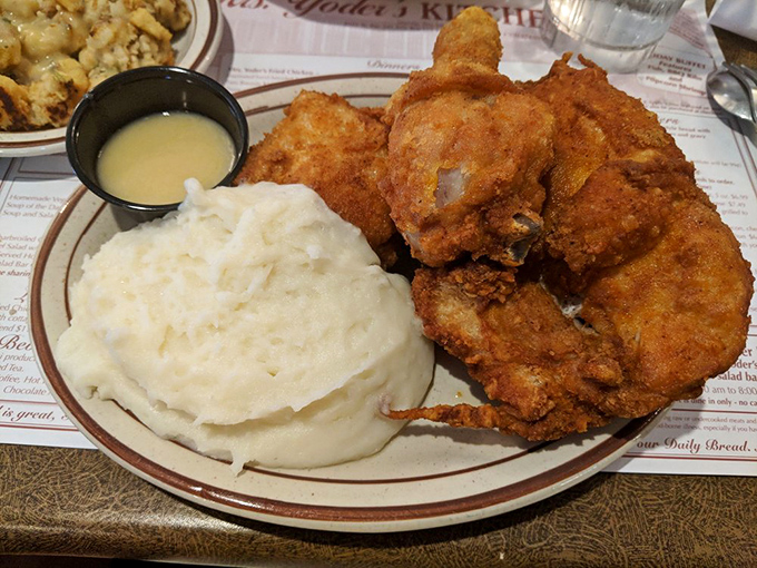 The holy grail of fried chicken&mdash;golden, crispy exterior giving way to juicy meat within. The mashed potatoes aren't just a side; they're a necessity.