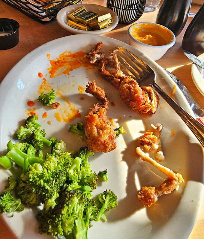 These aren't your average frog legs&mdash;they're crispy, golden-brown proof that sometimes the most unexpected menu items deliver the most delightful surprises.