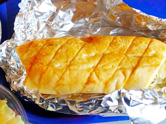 Garlic bread that's achieved the golden-brown perfection we all aspire to in life&mdash;crisp edges, soft center, and zero regrets.