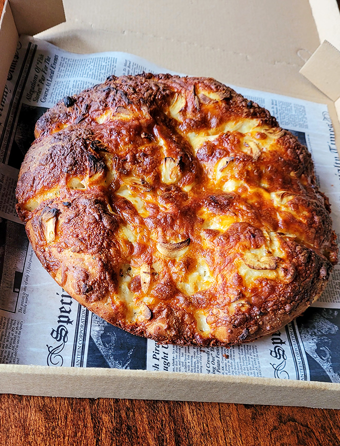 These garlic knots have achieved what most of us can only dream of: the perfect balance of crispy exterior and pillowy interior.