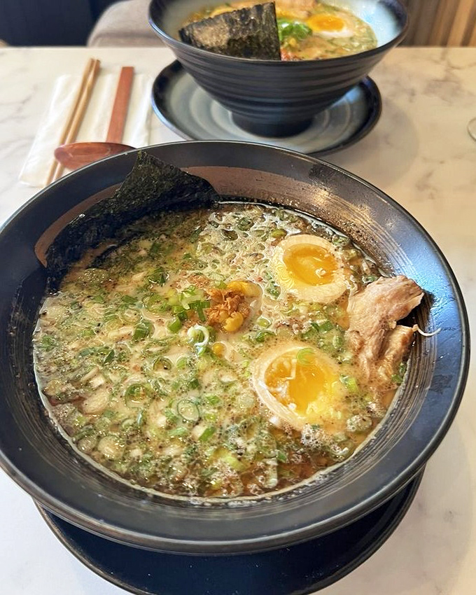 The Garlic Pork Shoyu Ramen arrives like a flavor symphony where every spoonful hits a different delicious note.