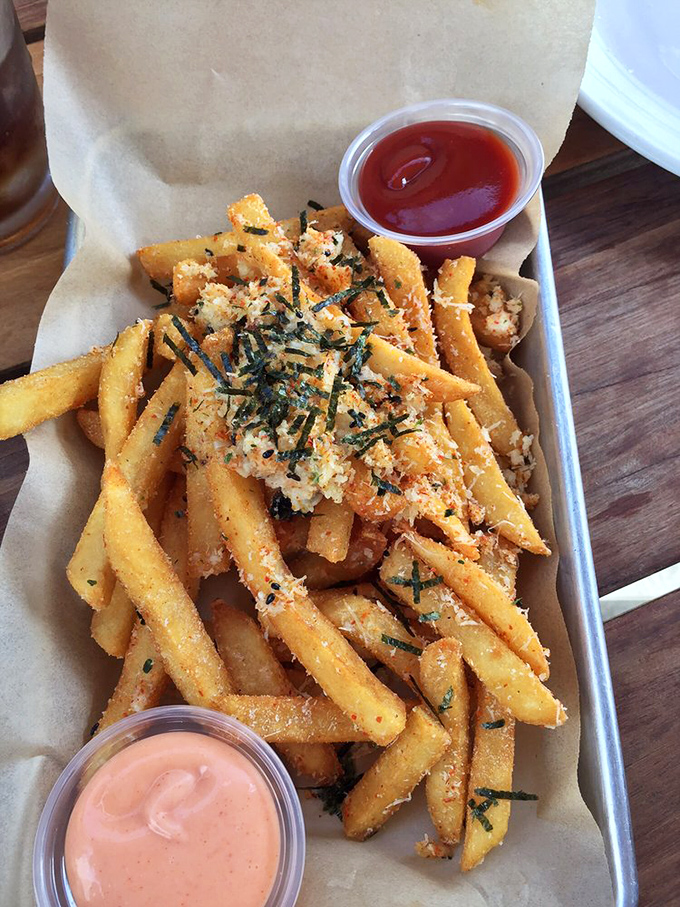 Golden fries dusted with parmesan and nori &ndash; proof that potatoes can achieve greatness with the right friends.
