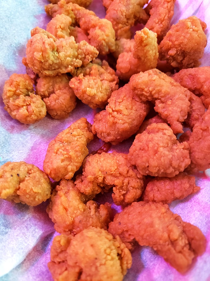 These golden-fried treasures aren't just appetizers &ndash; they're little crunchy flavor bombs that make you forget you're in Ohio and not a Gulf Coast shack.