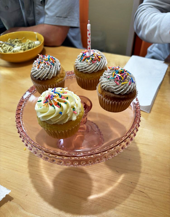 Birthday cupcakes that make candle-blowing an Olympic sport. That pink cake stand elevates the moment from "having dessert" to "hosting an event."