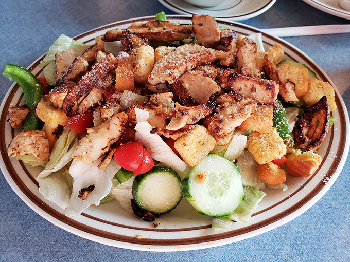 A grilled chicken salad that proves healthy eating doesn't have to be punishment. Those seasoned chunks are doing a victory dance.