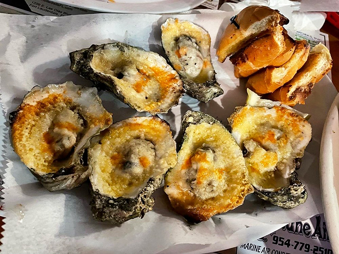 Grilled oysters that make you wonder why anyone would eat them any other way&mdash;cheesy, savory ocean jewels.