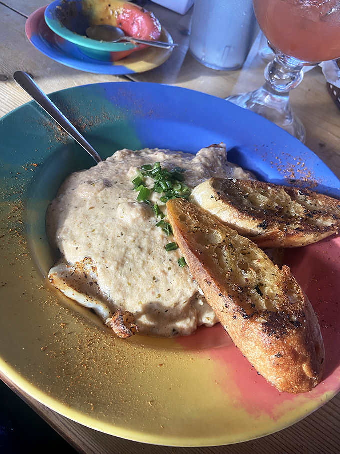 Creamy cheese grits that would make a Southern grandmother proud, paired with garlic toast perfect for sopping up every last bit.
