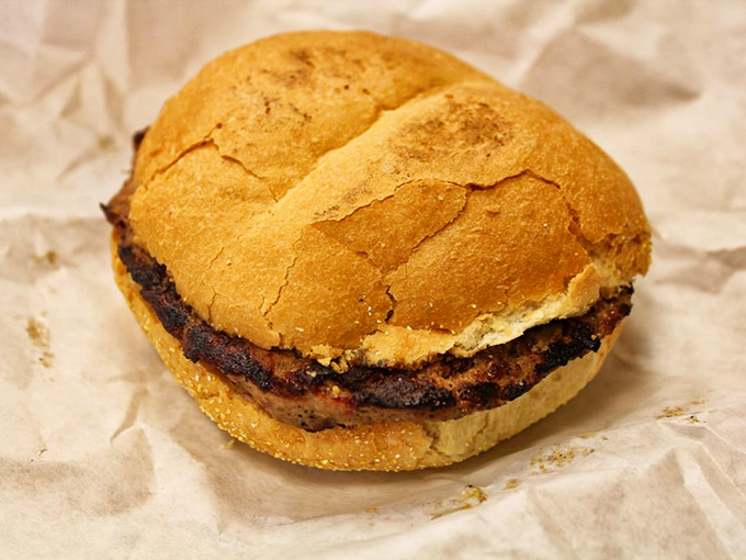 This isn't just a burger&mdash;it's a charcoal-kissed masterpiece on a Manderfield's hard roll that makes fast food chains weep with inadequacy.