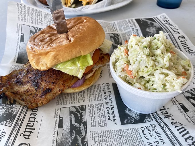 A fish sandwich that would make other sandwiches jealous, served with coleslaw so fresh it deserves its own fan club.