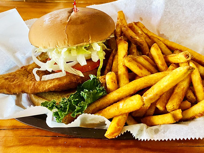 This grouper sandwich doesn't need fancy frills&mdash;just perfectly fried fish, fresh toppings, and golden fries that'll make you forget all about your diet plans.