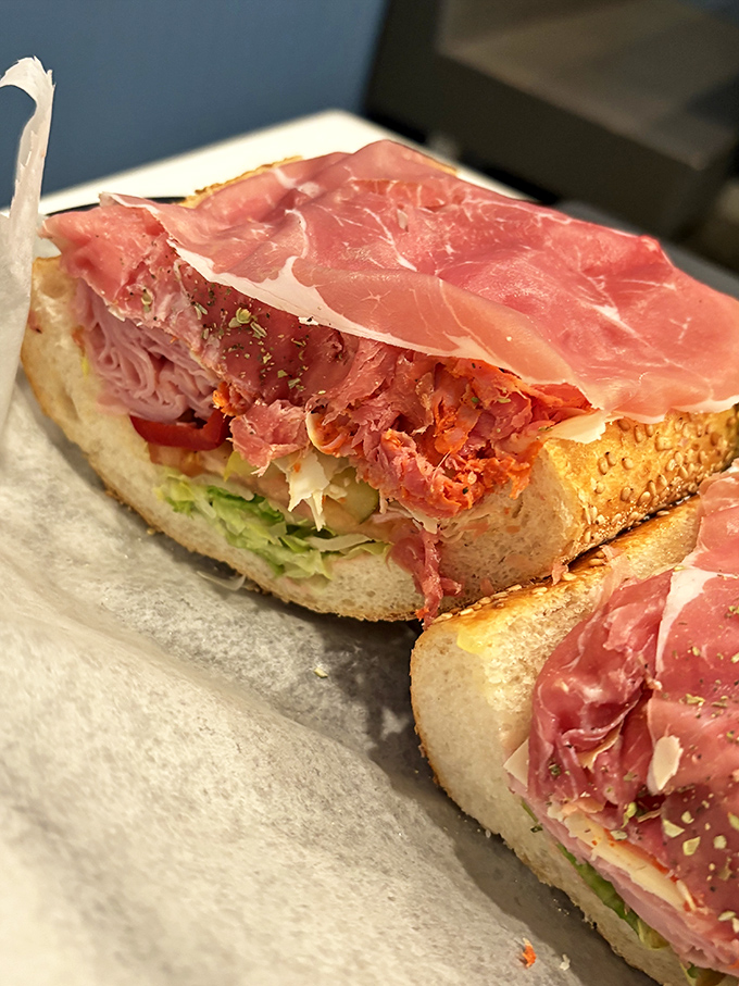 Layers of ham stacked higher than your expectations, proving that sometimes more really is more.