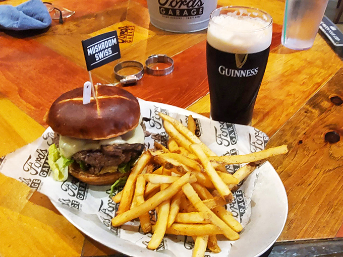 Burger bliss achieved! A perfectly grilled patty nestled on a branded bun with golden fries&mdash;the automotive theme extends right to your taste buds.