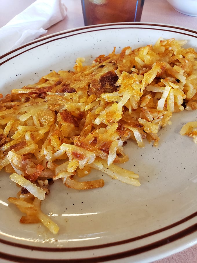 Hash browns achieving that golden-brown perfection that makes you forget vegetables are supposed to be healthy.
