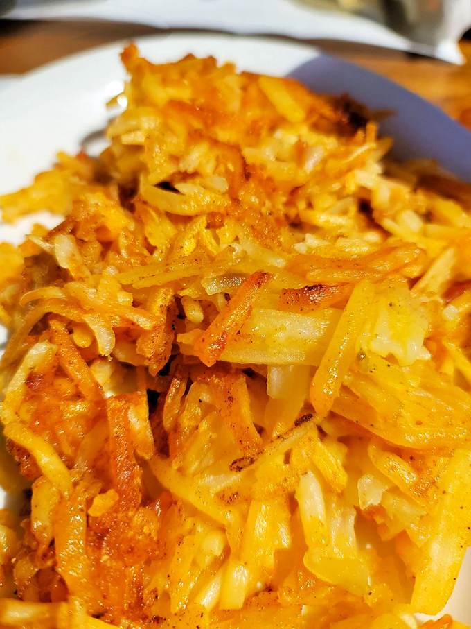 These aren't just hash browns&mdash;they're golden-brown potato architecture, crispy on the outside, tender within. Breakfast engineering at its finest.