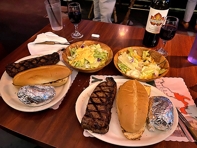 A feast fit for the Doge of Venice himself. Two perfectly grilled New York strips, foil-wrapped baked potatoes, and salads that know their supporting role.