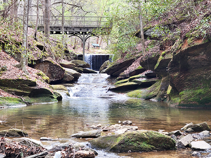 Henderson Falls Park delivers tranquility on tap&mdash;a peaceful stream cascading over ancient rocks beneath a rustic bridge. Stress doesn't stand a chance here.